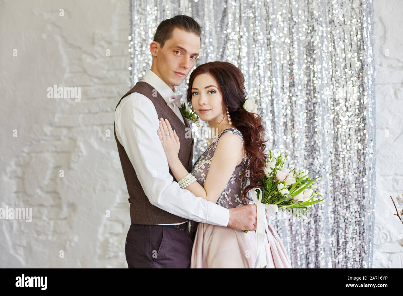 Bride and groom hug and pose for the wedding. Love and tenderness in ...
