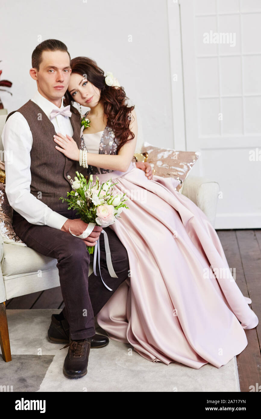 Bride and groom hug and pose for the wedding. Love and tenderness in ...