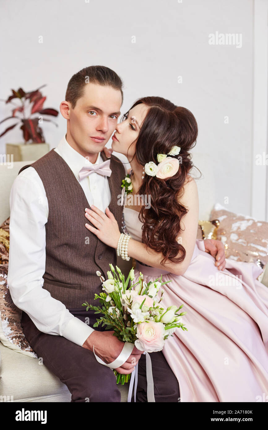 Bride and groom hug and pose for the wedding. Love and tenderness in ...