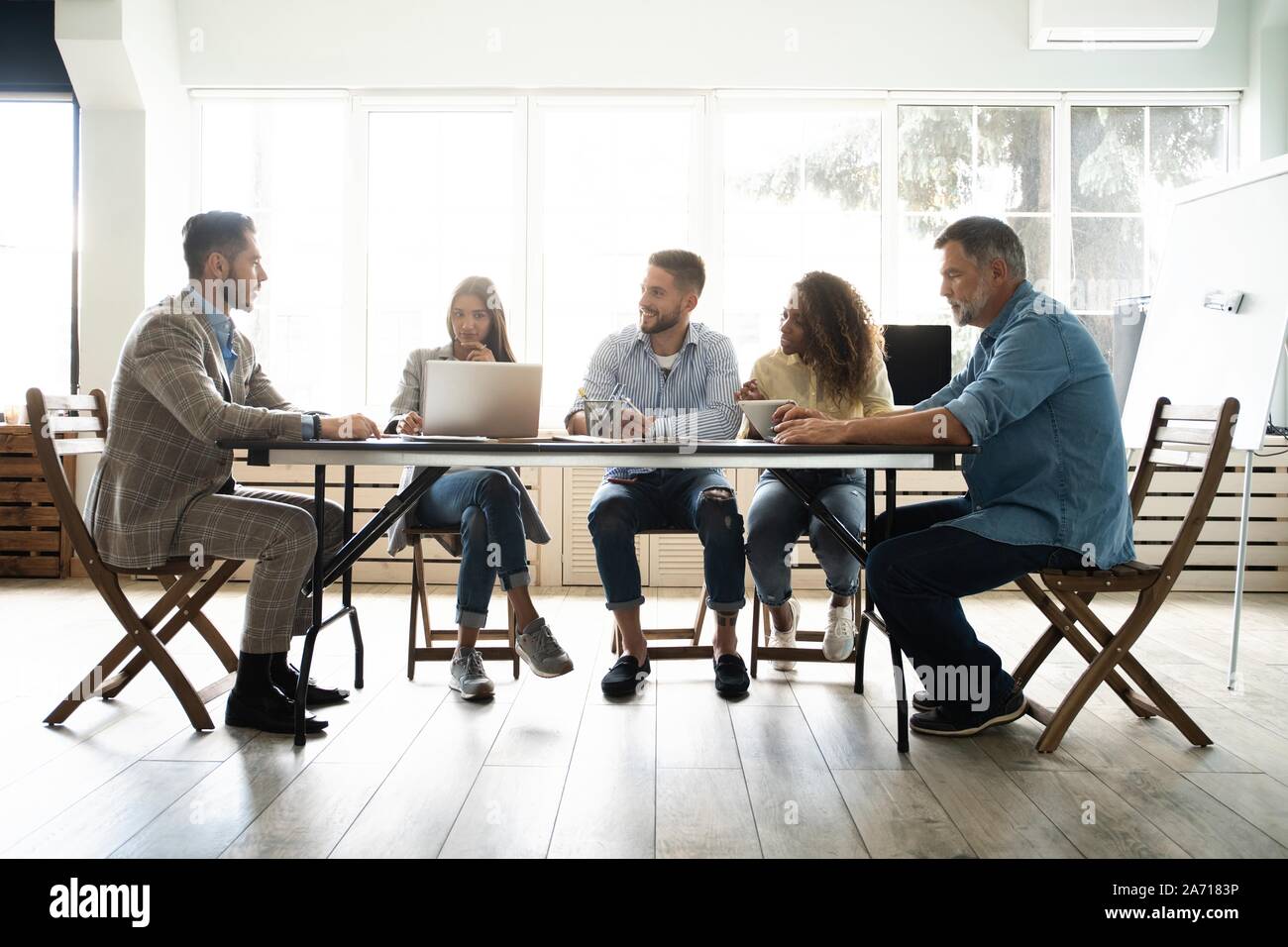 Colleagues at an office meeting Stock Photo - Alamy