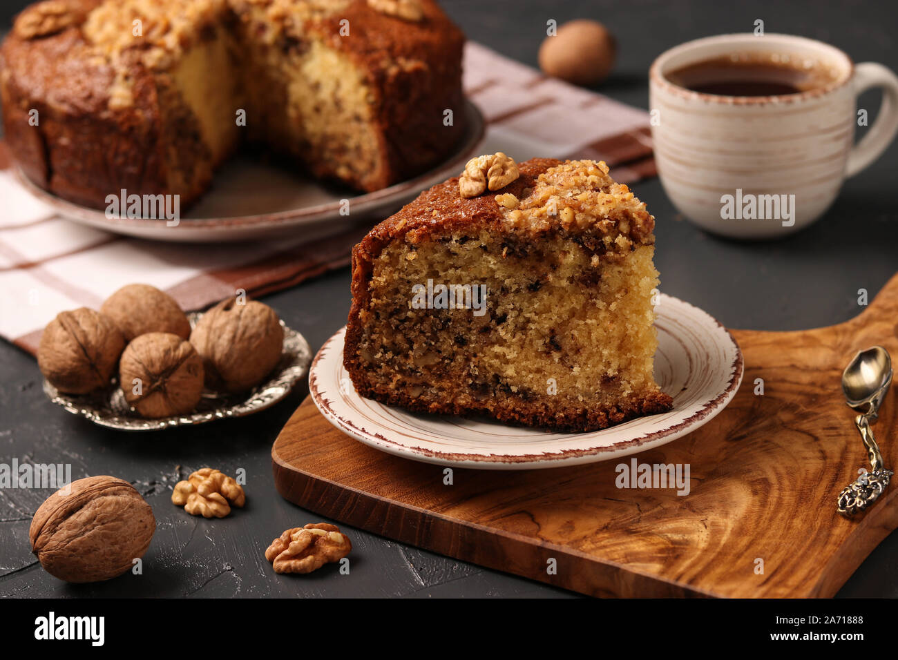 American homemade nutty cake is located on a dark background Stock ...
