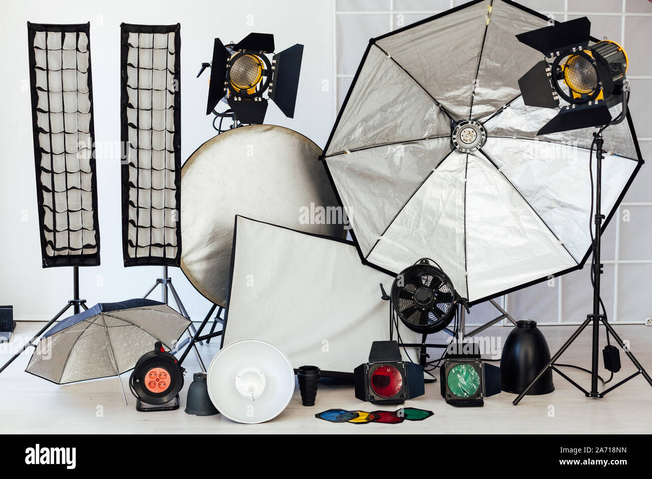 Photo studio equipment flash accessories photographer on a white ...