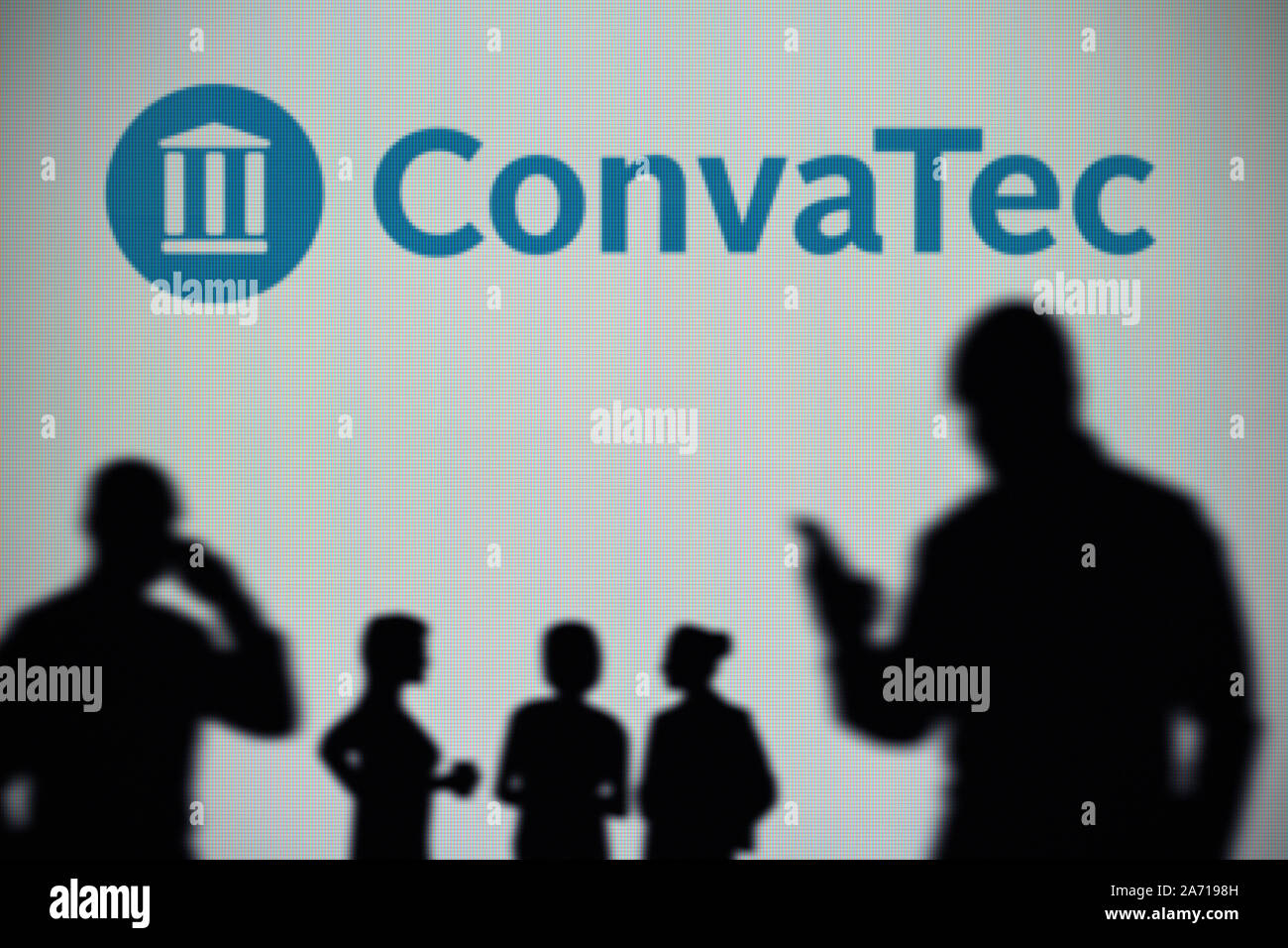 The ConvaTec logo is seen on an LED screen in the background while a ...