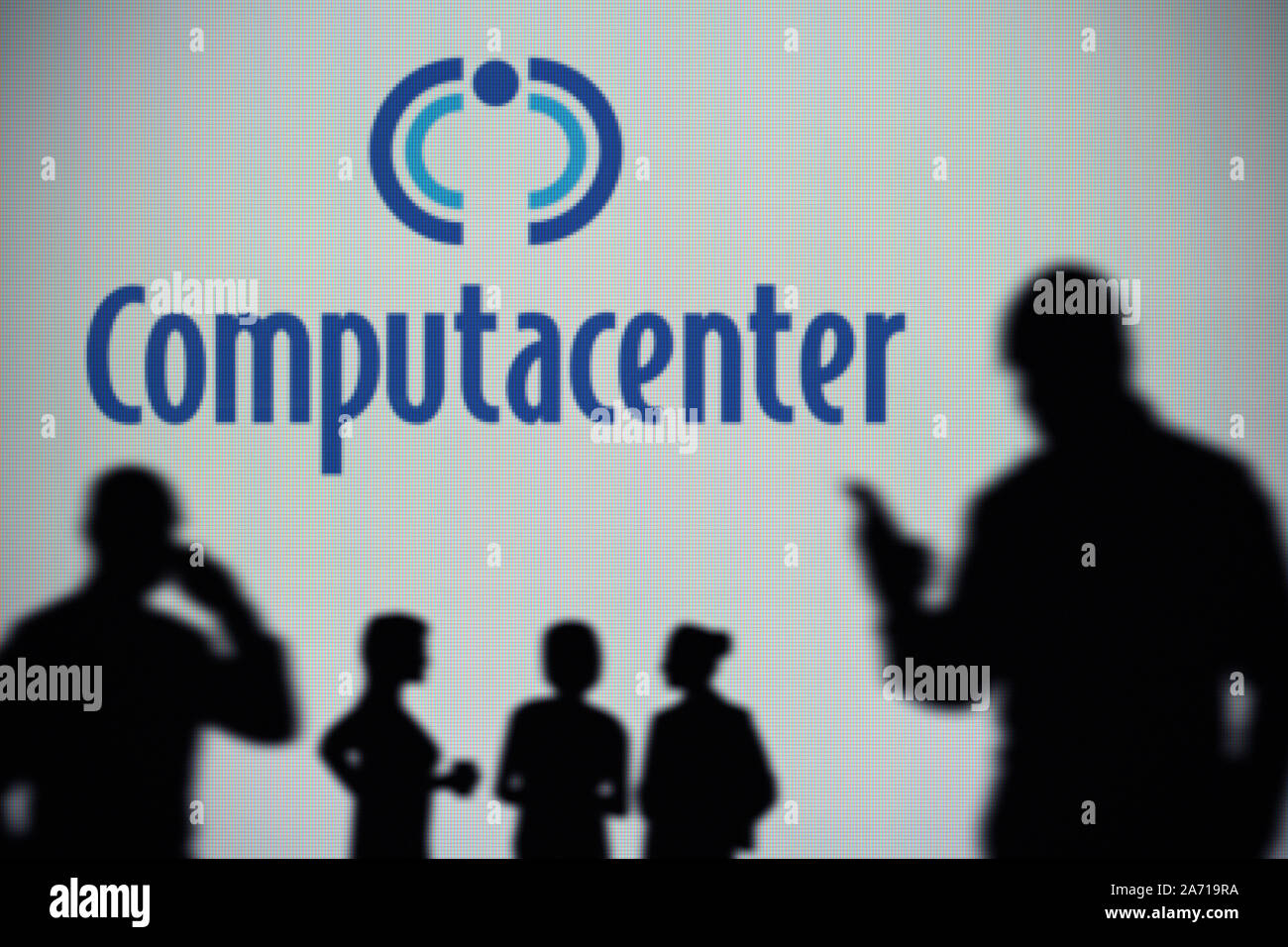The Computacenter logo is seen on an LED screen in the background while ...