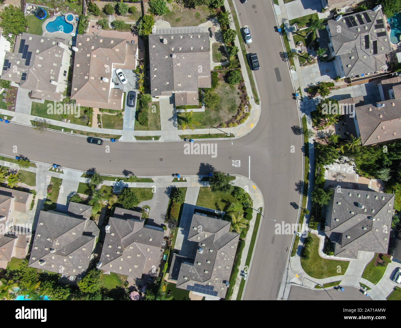Aerial top view suburban neighborhood with big villas next to each ...