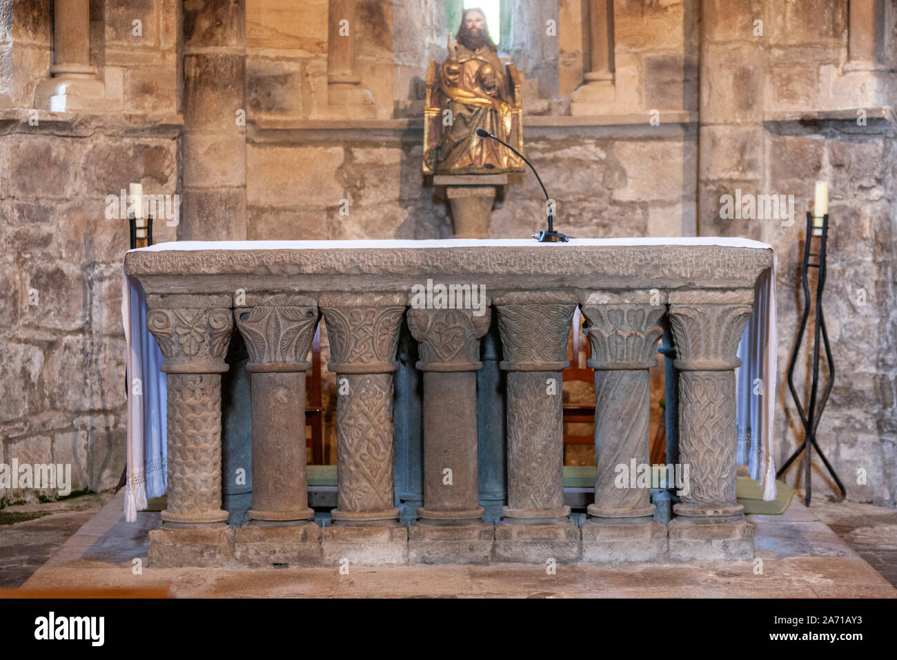 Altar table with Romanesque columns, set of columns with carved shafts ...