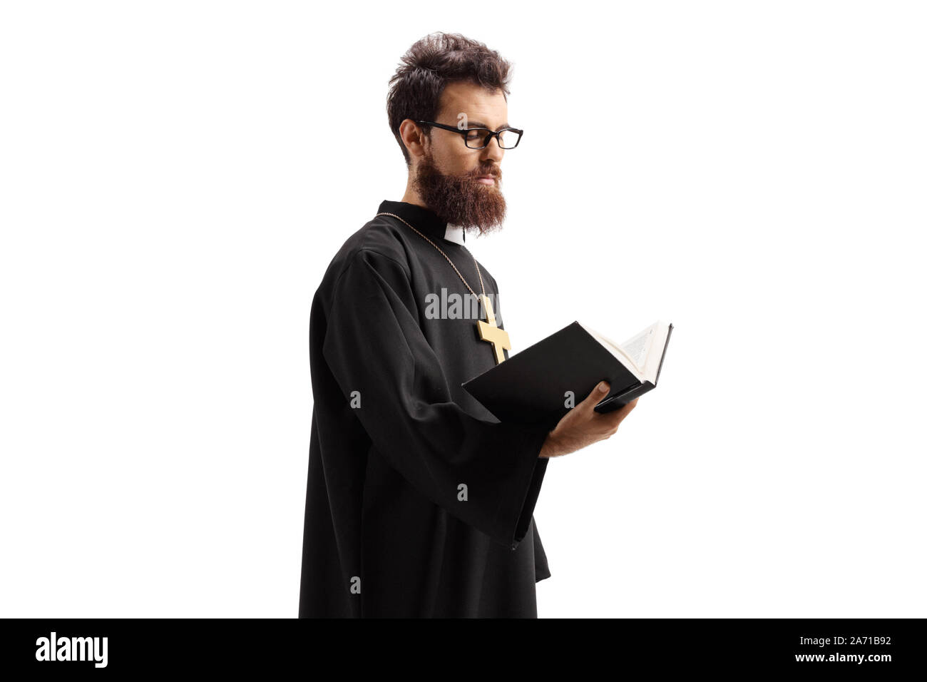 Priest reading from the Bible isolated on white background Stock Photo ...
