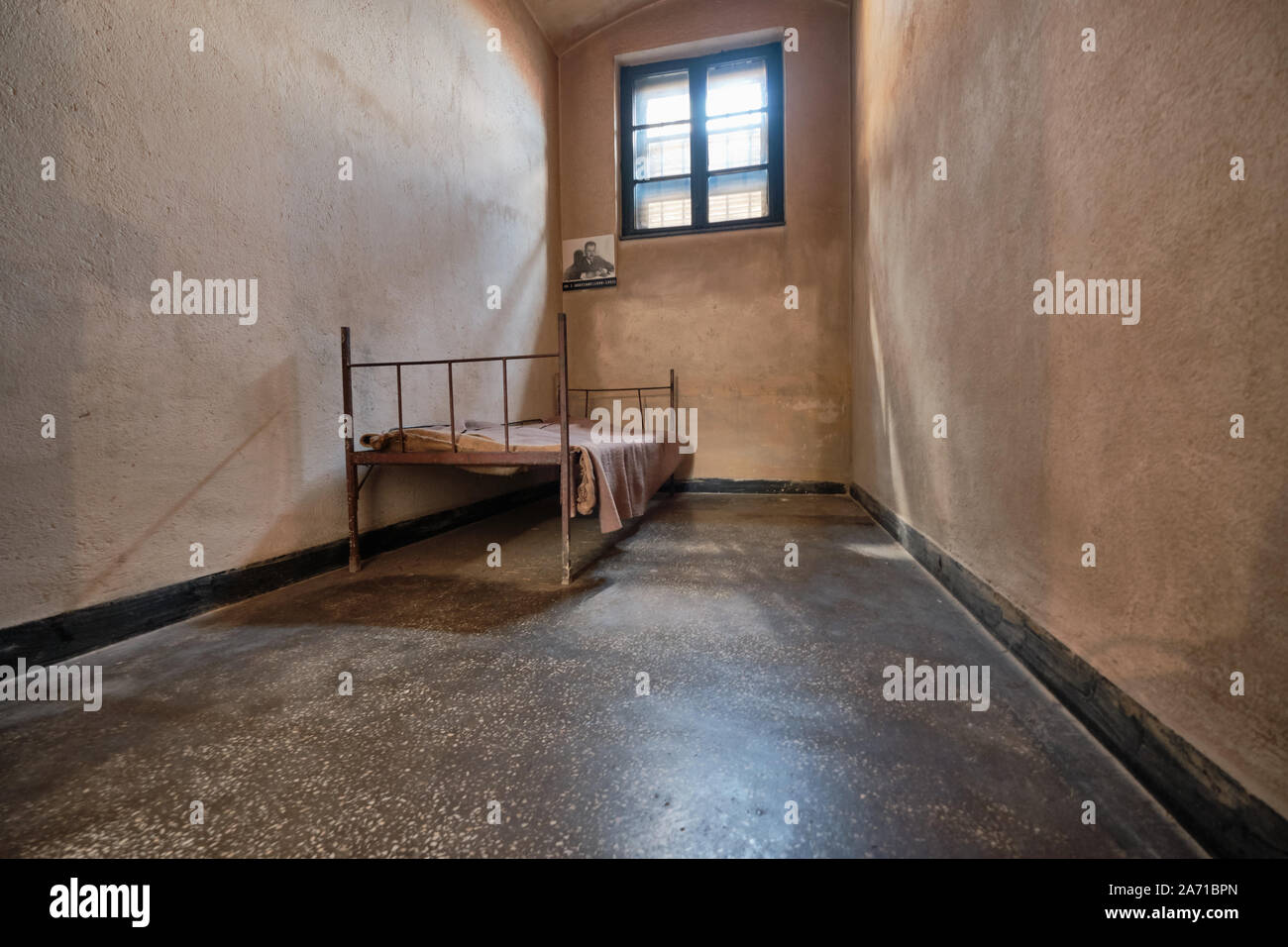 Inside of a former cell with bed in Memorial of the victims of ...
