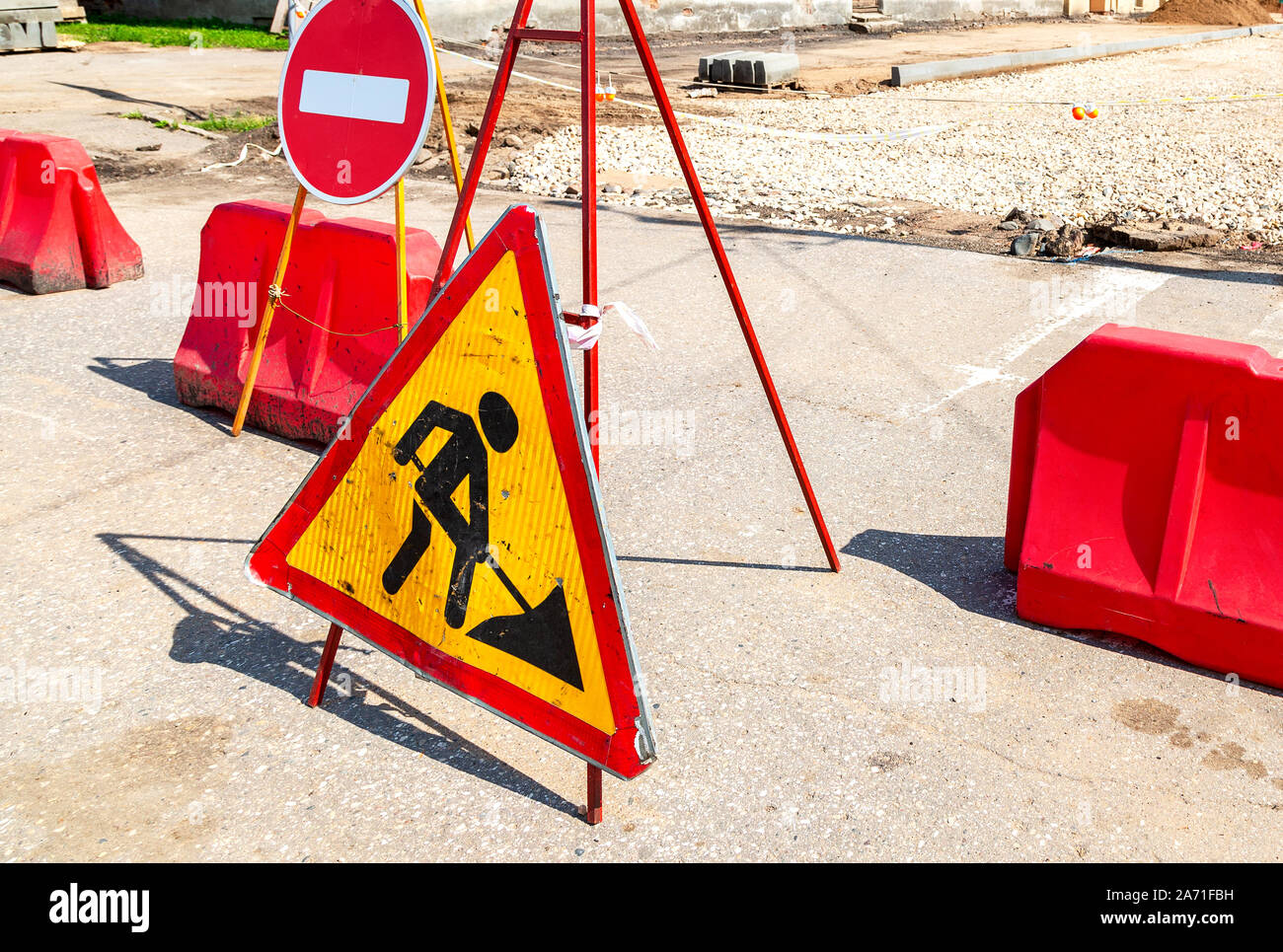 Road works traffic sign at the city street, stop sign. Road under ...