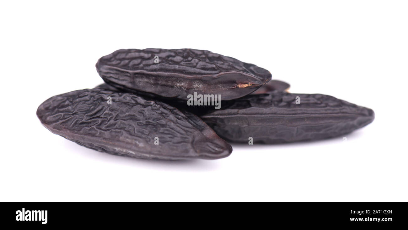 Tonka beans isolated on white background. Bean of Dipteryx odorata ...