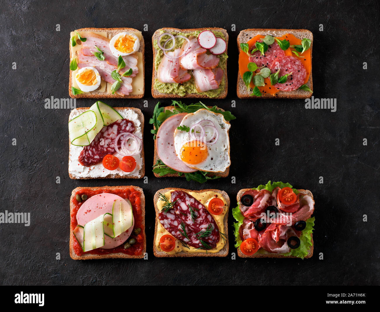 Set of eight different sandwiches with meat in square shape, copy space ...