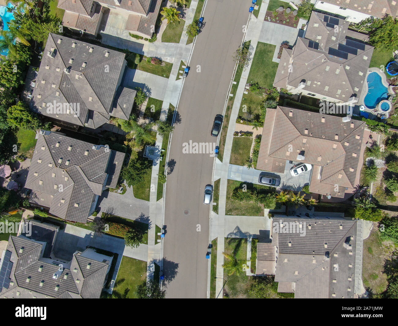 Aerial top view suburban neighborhood with big villas next to each ...