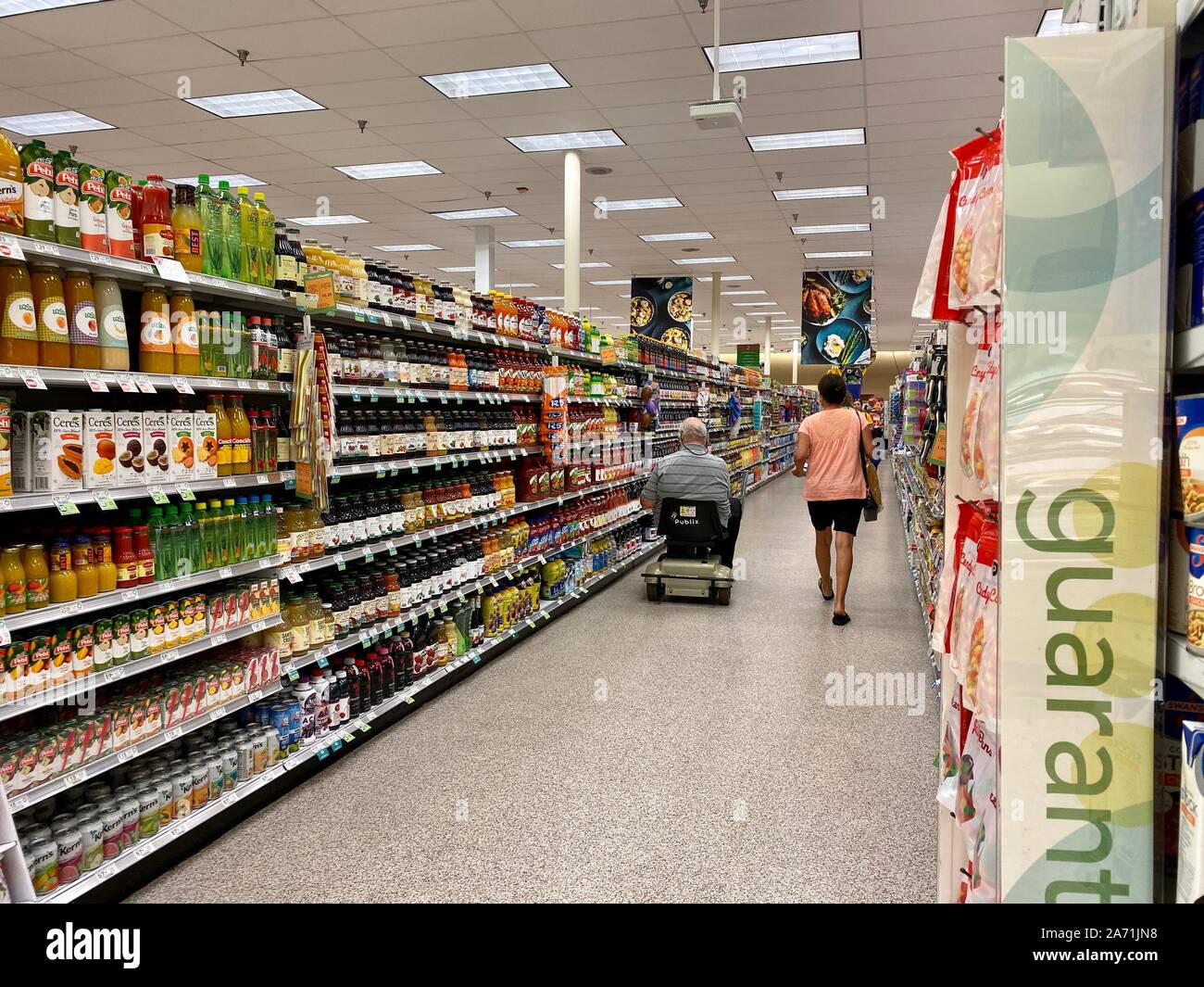 Vero Beach, FL/USA-10/28/19: A disabled senior citizen shopping in the ...