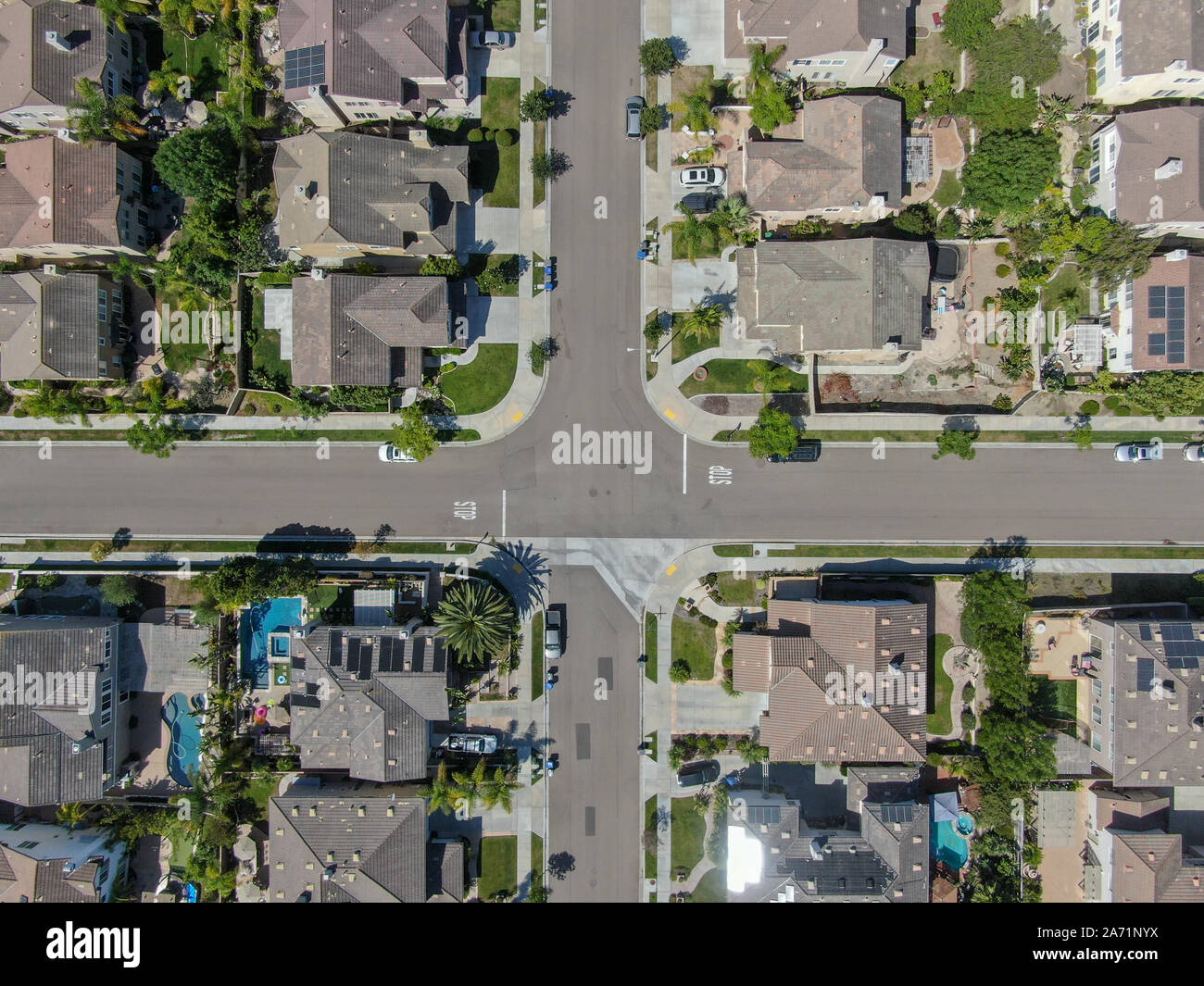 Aerial top view suburban neighborhood with big villas next to each ...