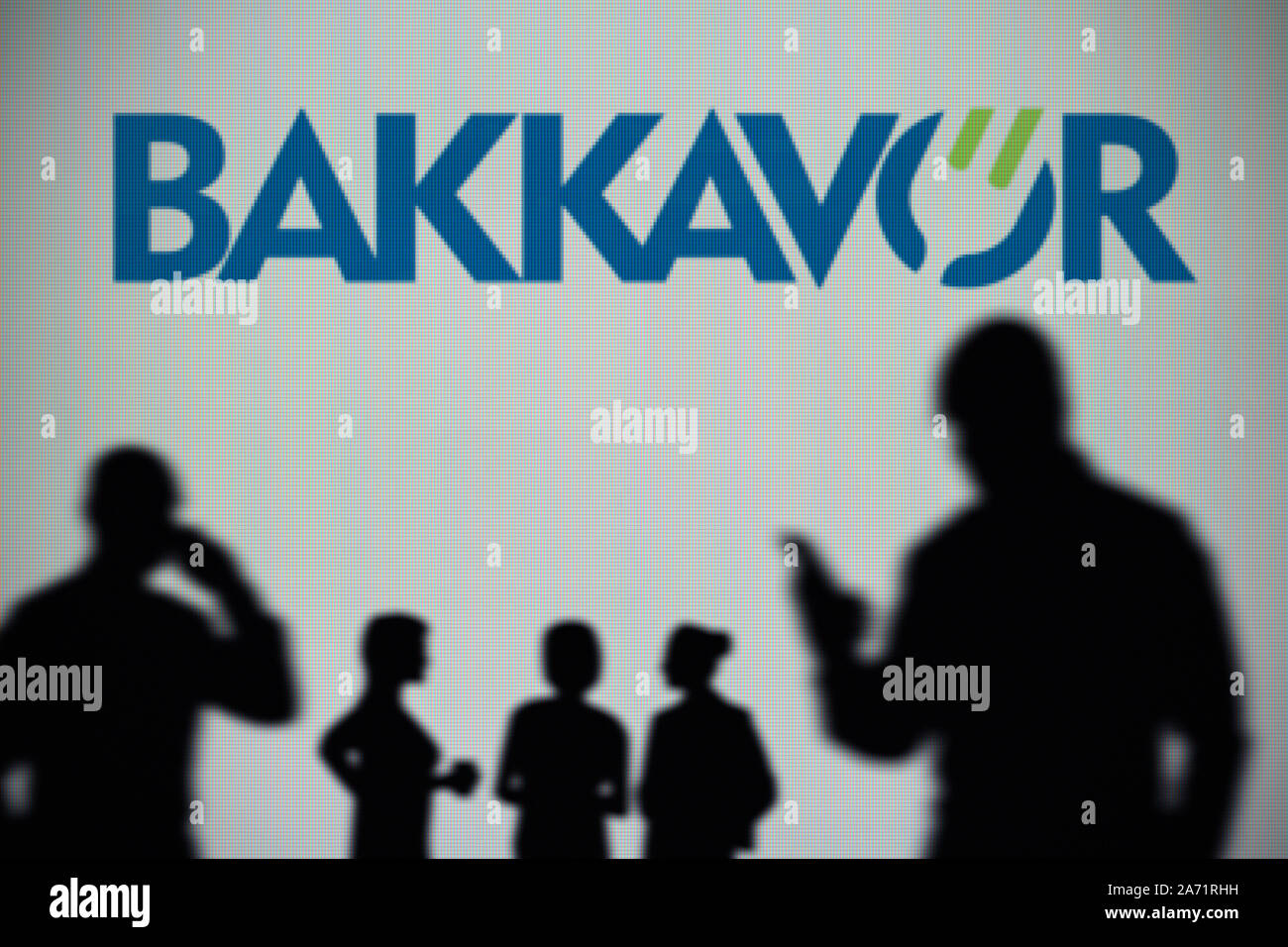 The Bakkavor logo is seen on an LED screen in the background while a ...