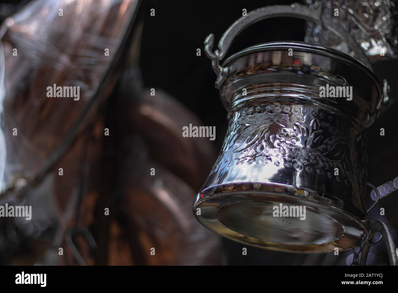 Metal cauldron close-up. Patterns on the flower Stock Photo - Alamy