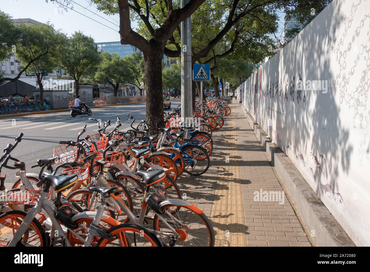 Bicycles parked along a road in Beijing Stock Photo - Alamy