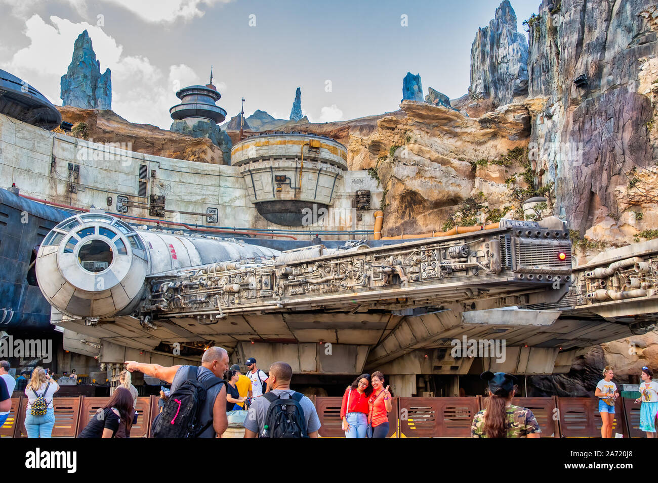 People walking around a life size model of the Millenium Falcon Stock ...