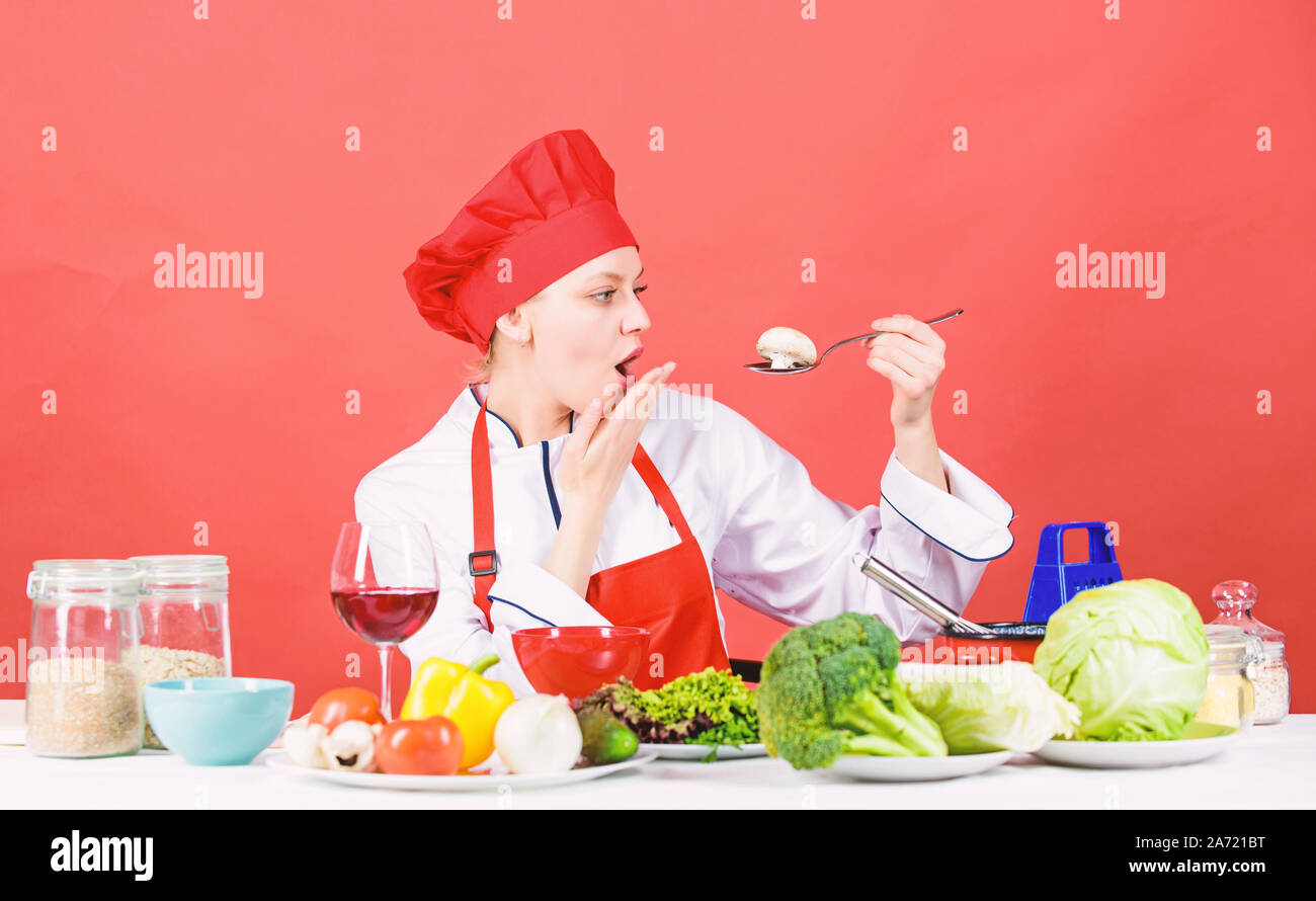 Girl at kitchen table. Cooking food and housekeeping. Housewife routine ...