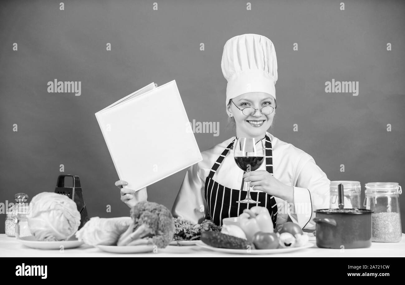 Traditional cuisine. Culinary school concept. Female in hat and apron ...