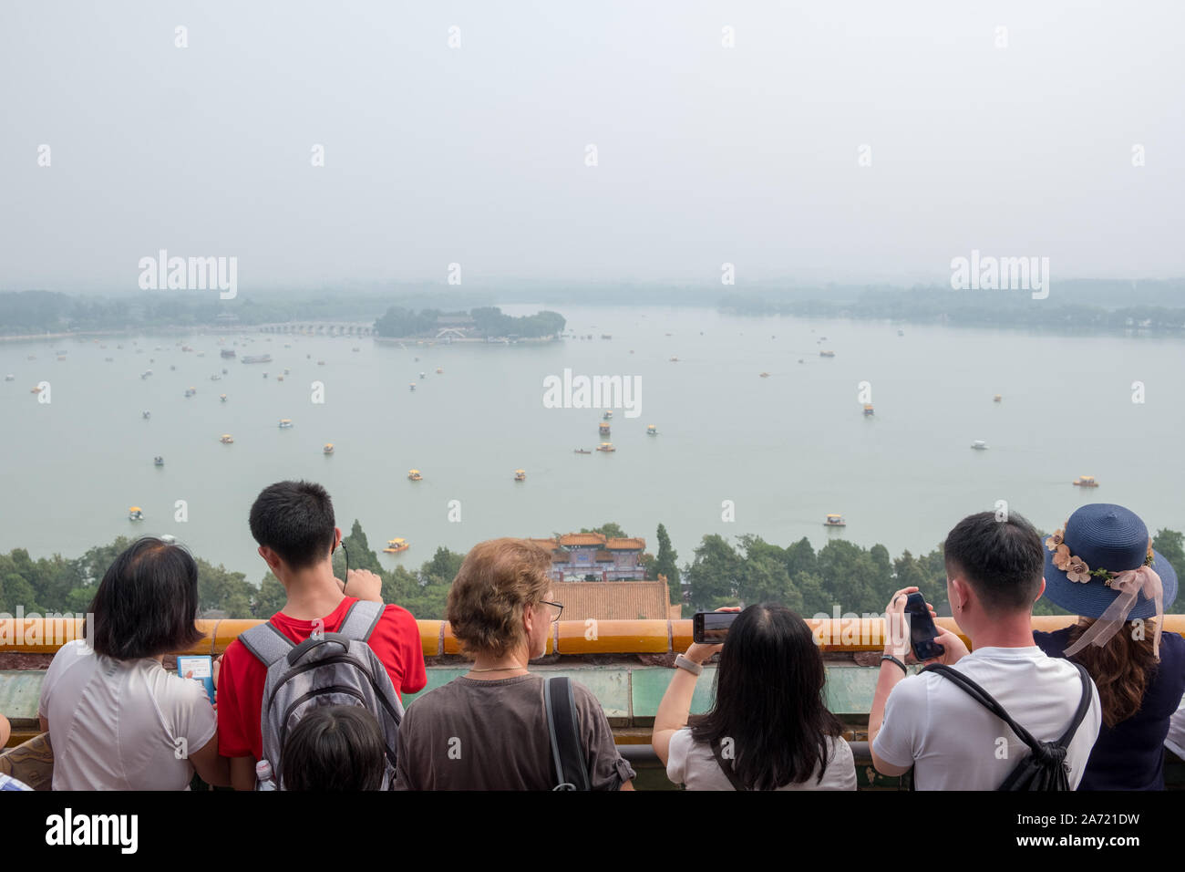Tourist looking over the lake Stock Photo - Alamy