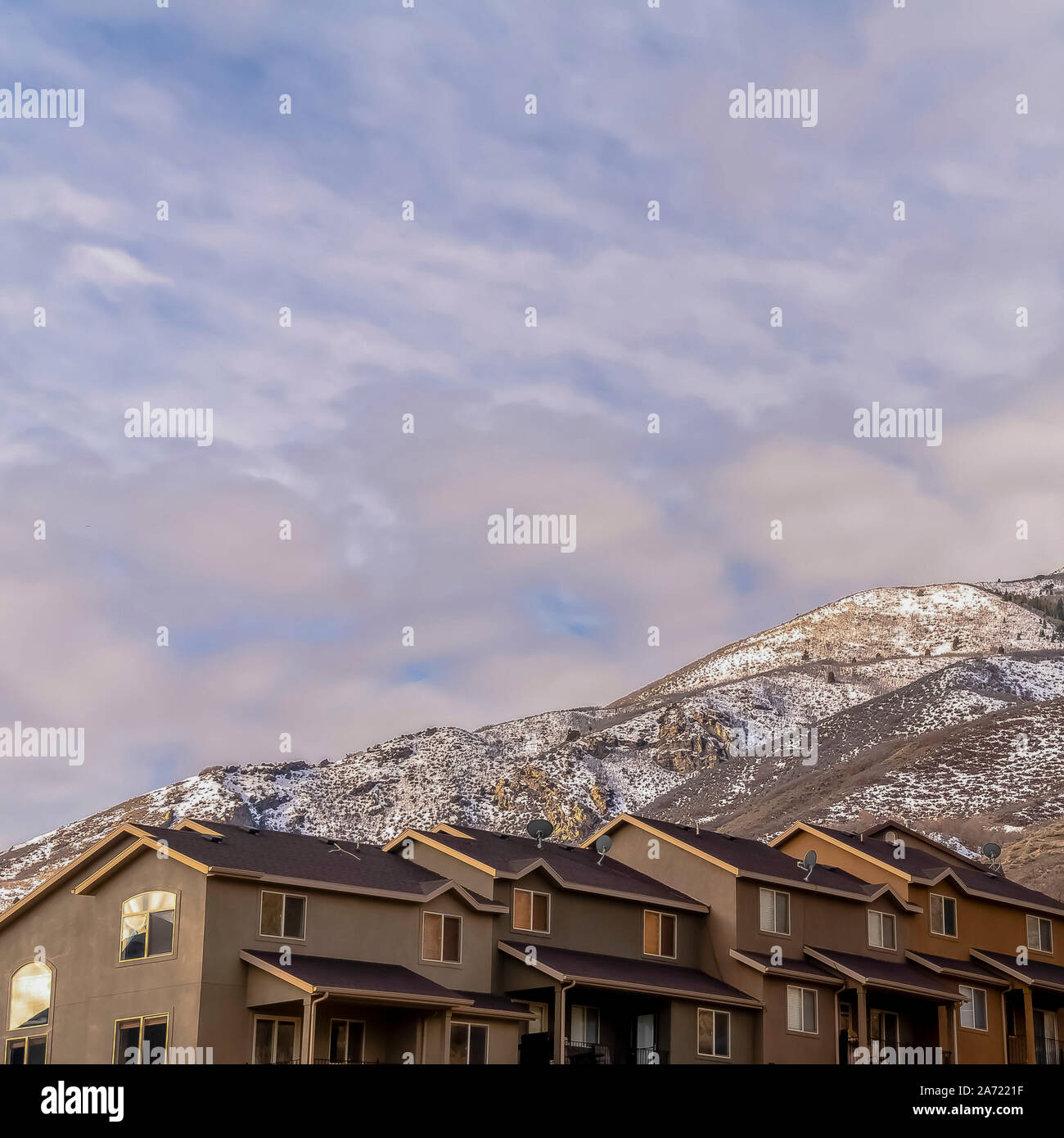 Square Cluster housing development on a mountain slope Stock Photo - Alamy