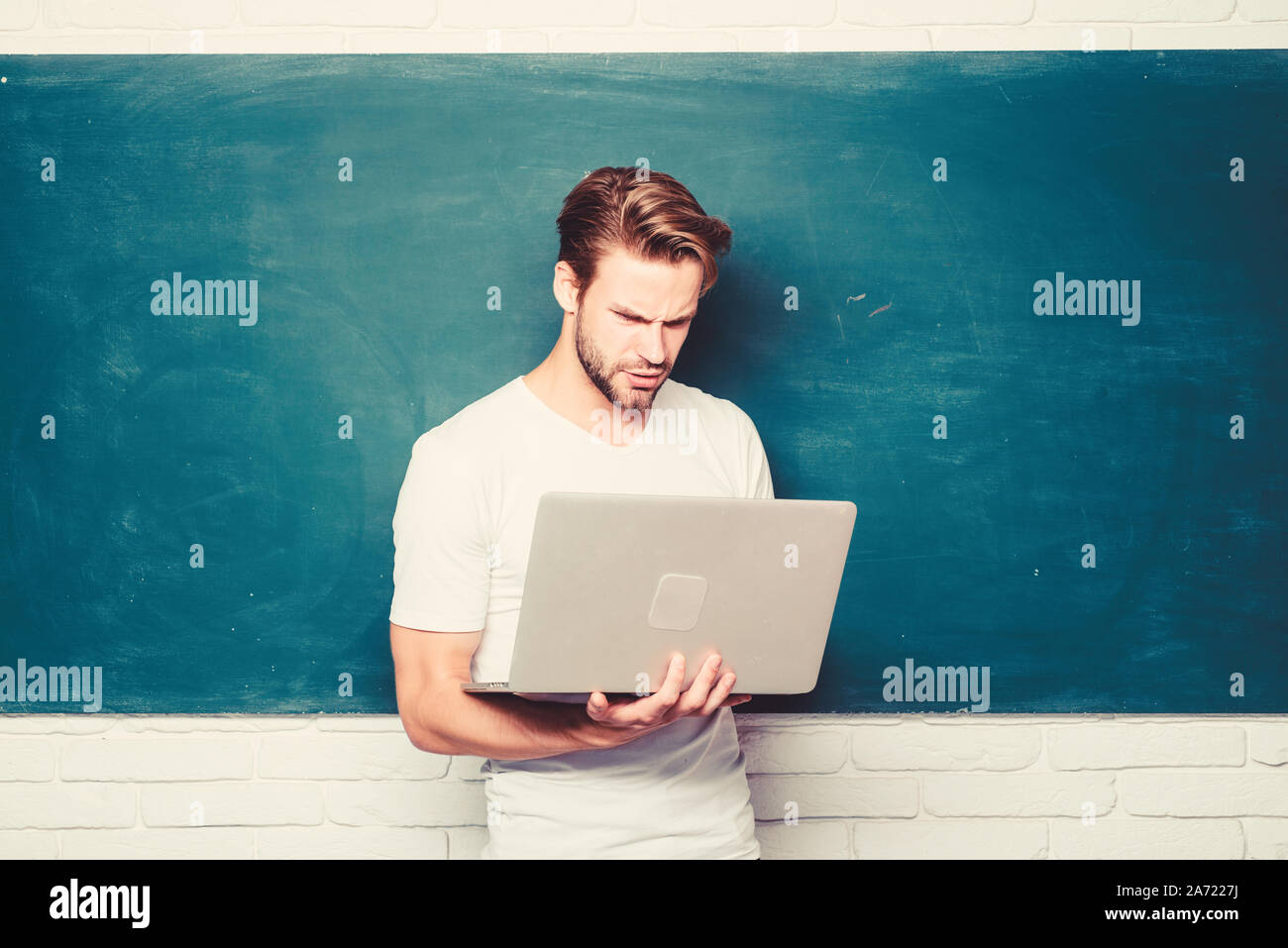 Student learn programming language. School teacher programming with ... Student learn programming language. School teacher programming with ...