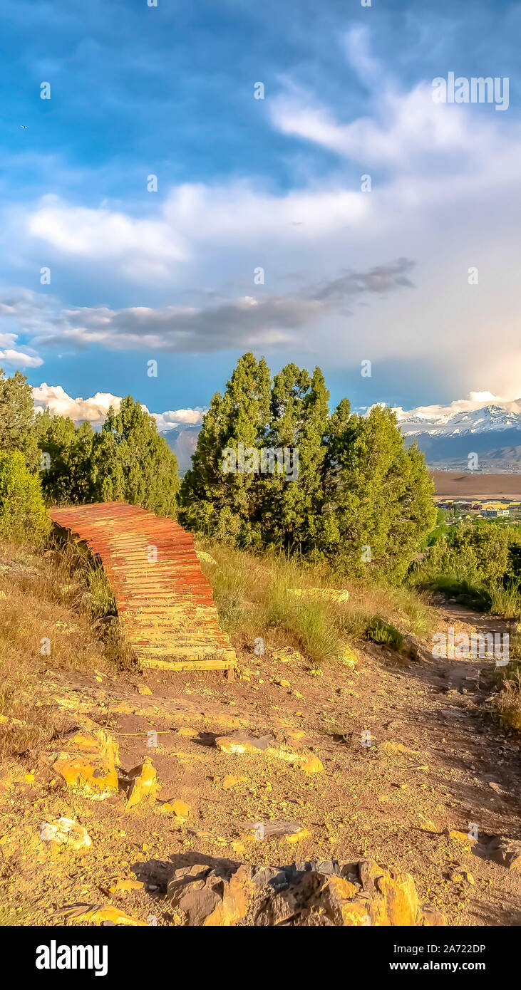 Vertical frame Hiking trail on a mountain slope with boardwalk Stock ...