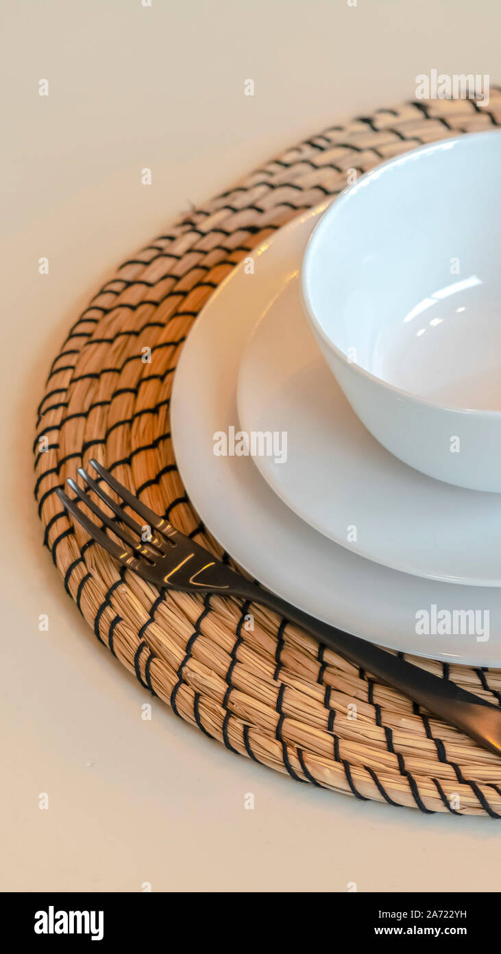 Vertical Single table setting with cutlery and crockery Stock Photo - Alamy