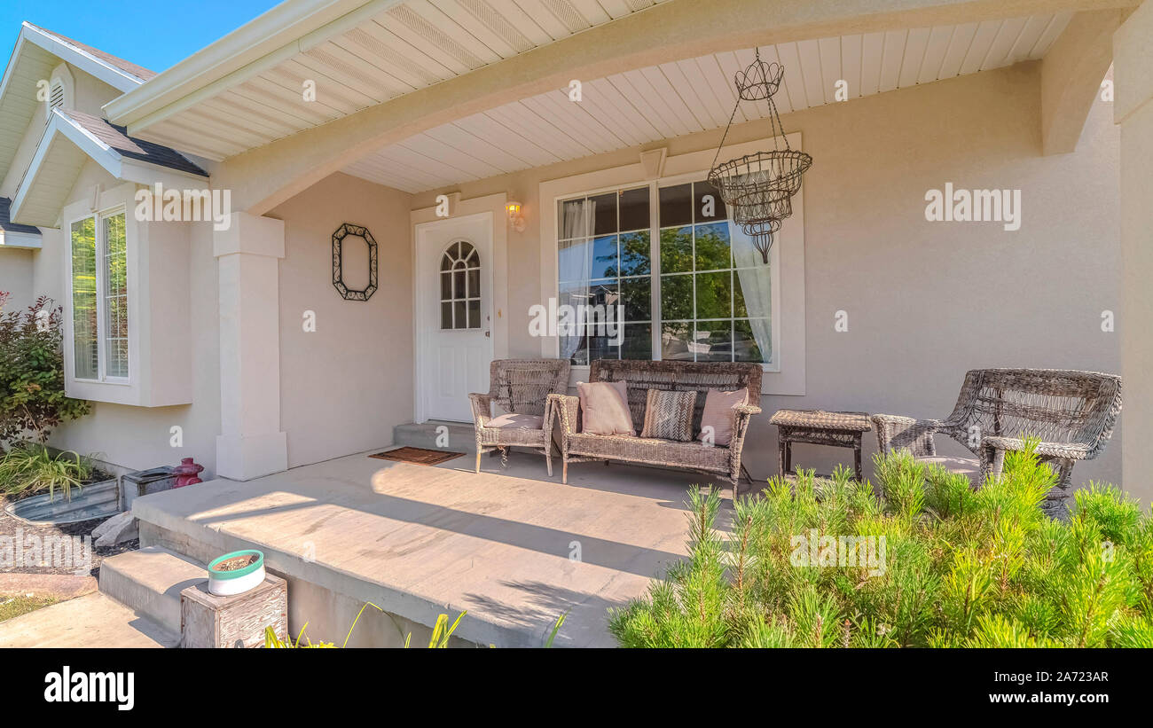 Panorama Front porch and garden of a traditional home Stock Photo - Alamy