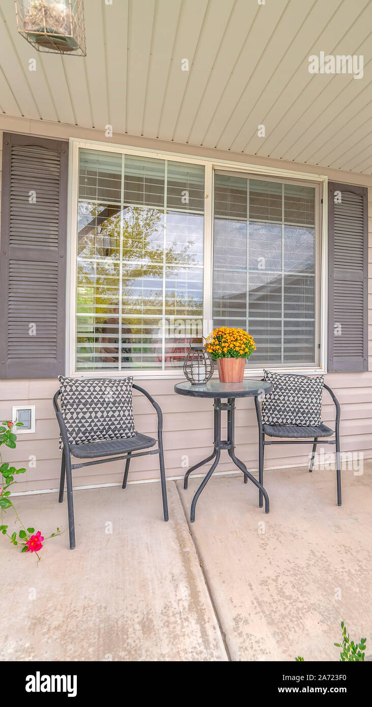 Vertical Front veranda of modern home and outdoor furniture Stock Photo ...