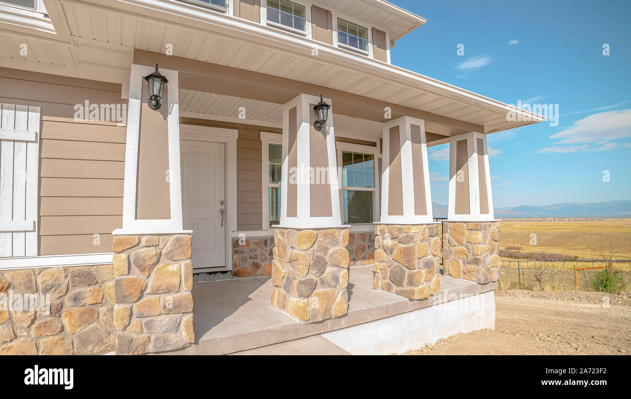 Panorama frame Front porch and door of new two storey home Stock Photo ...