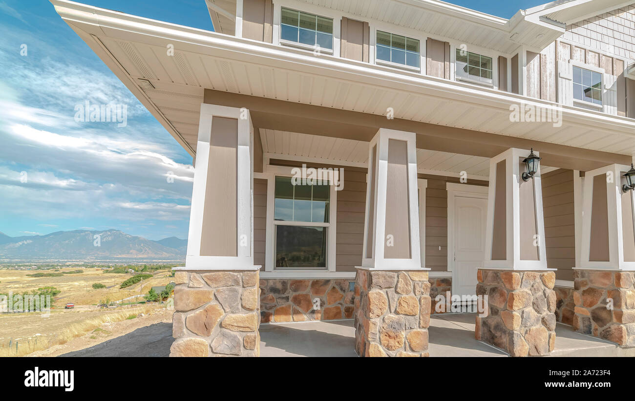 Panorama Front porch and door of new traditional home Stock Photo - Alamy