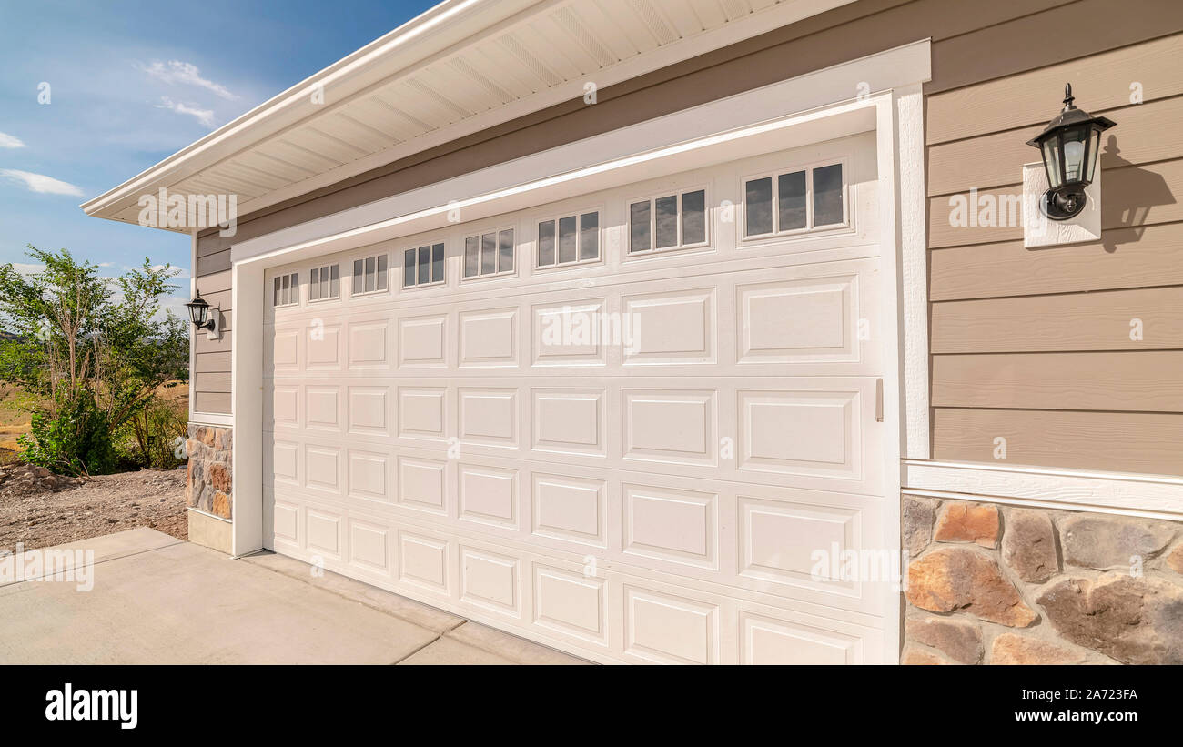 Panorama frame Double garage of modern home on sunny, clear day Stock ...
