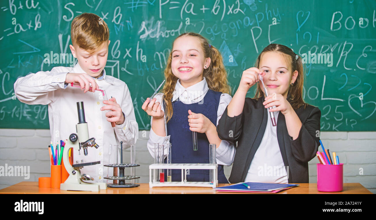 Analyzing strategy. Little children at laboratory. Little kids learn ...