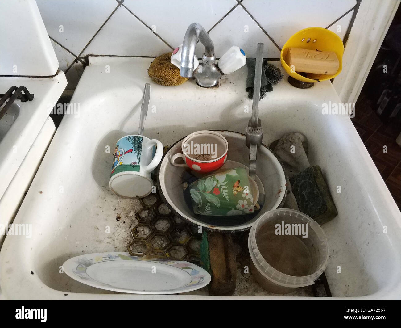 mess and dump. An old room with lots of things. Devastation. Very small ...