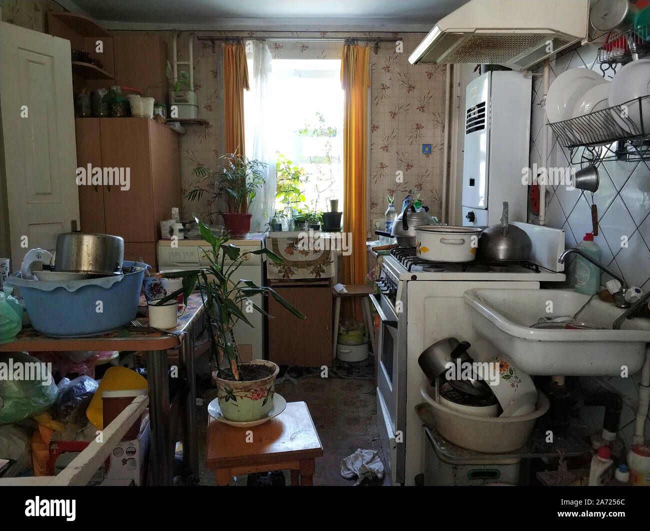 mess and dump. An old room with lots of things. Devastation. Very small ...