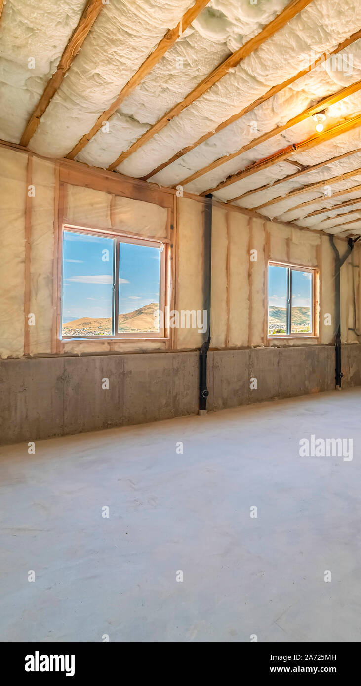 Vertical Unfinished room in a new build house Stock Photo - Alamy