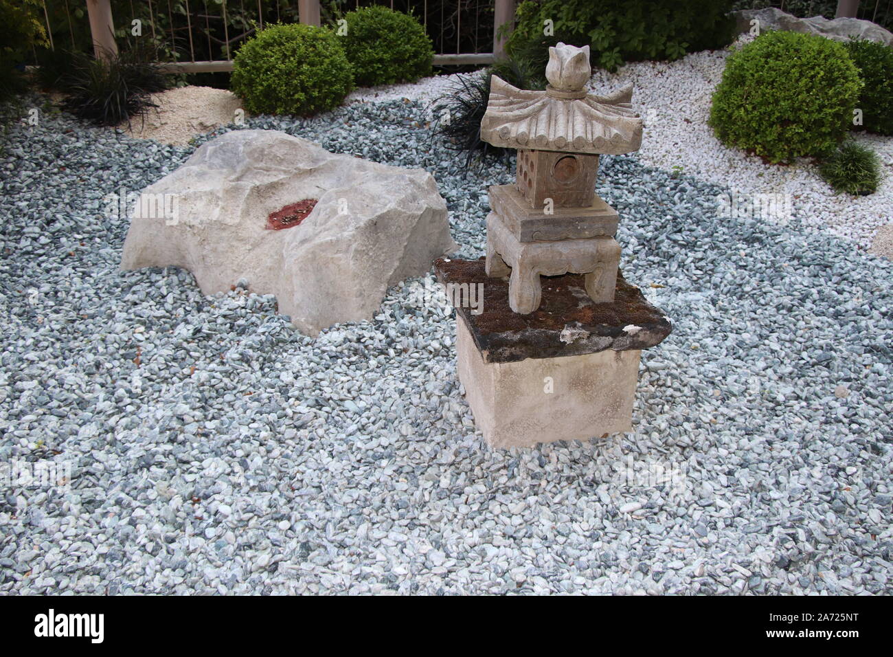 Zen garden pattern on sand and stone. Top view. Meditation and harmony ...
