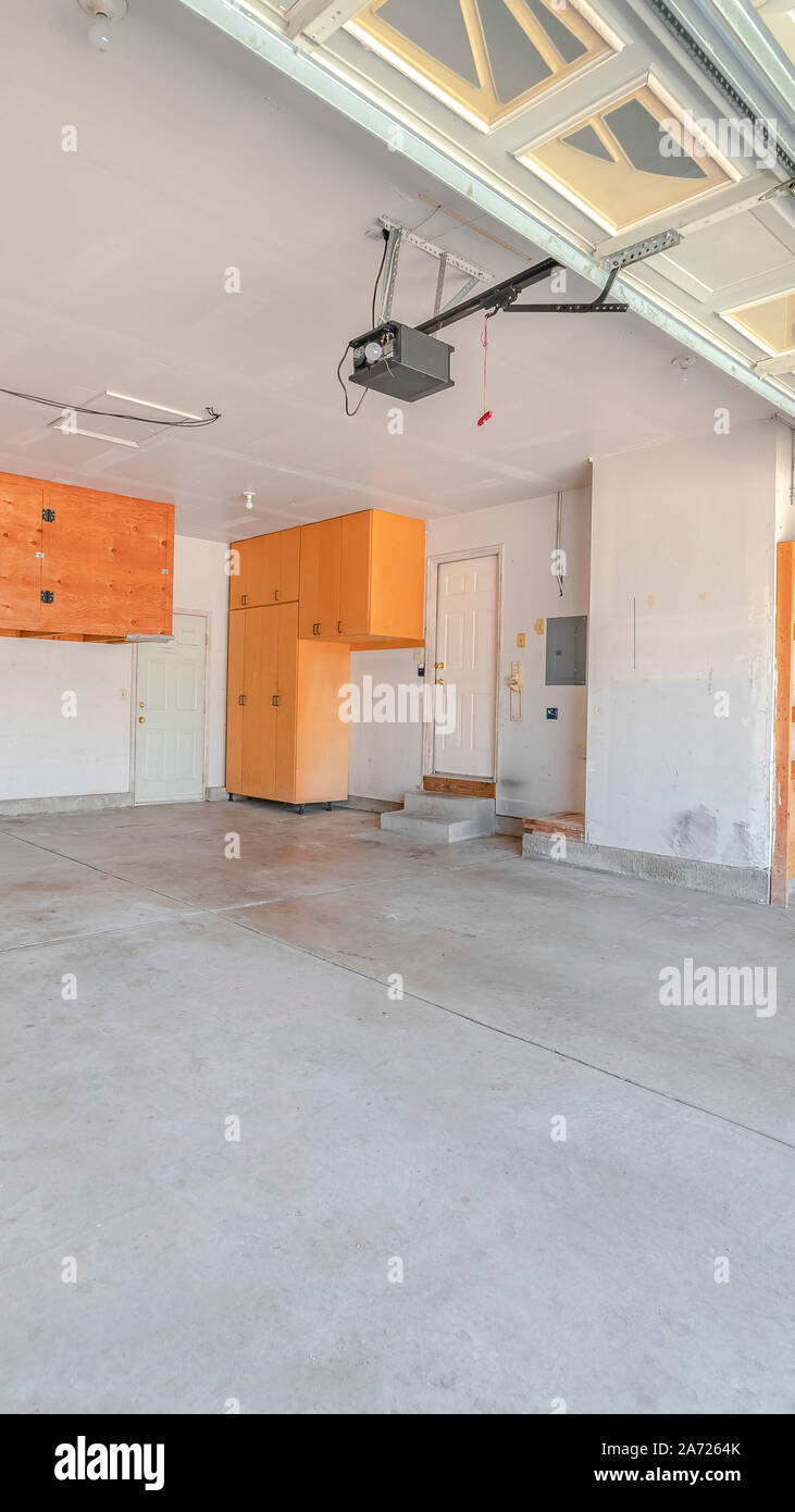 Vertical Interior of an empty, modern double garage Stock Photo - Alamy