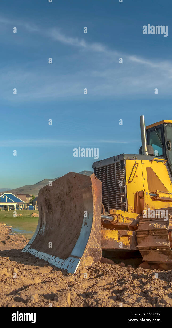 Vertical frame Bulldozer at a construction site with copy space Stock ...