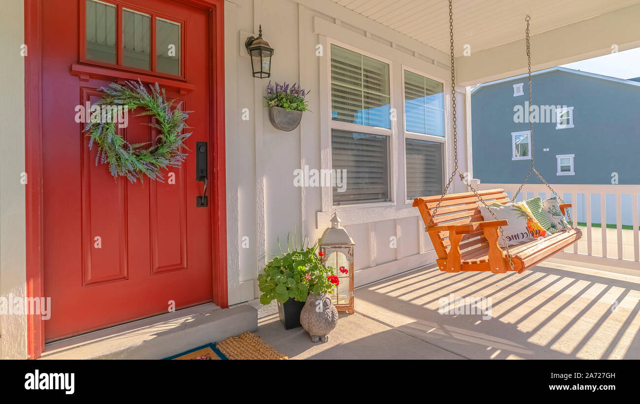 Panorama frame Front porch of modern home with swinging chair Stock ...
