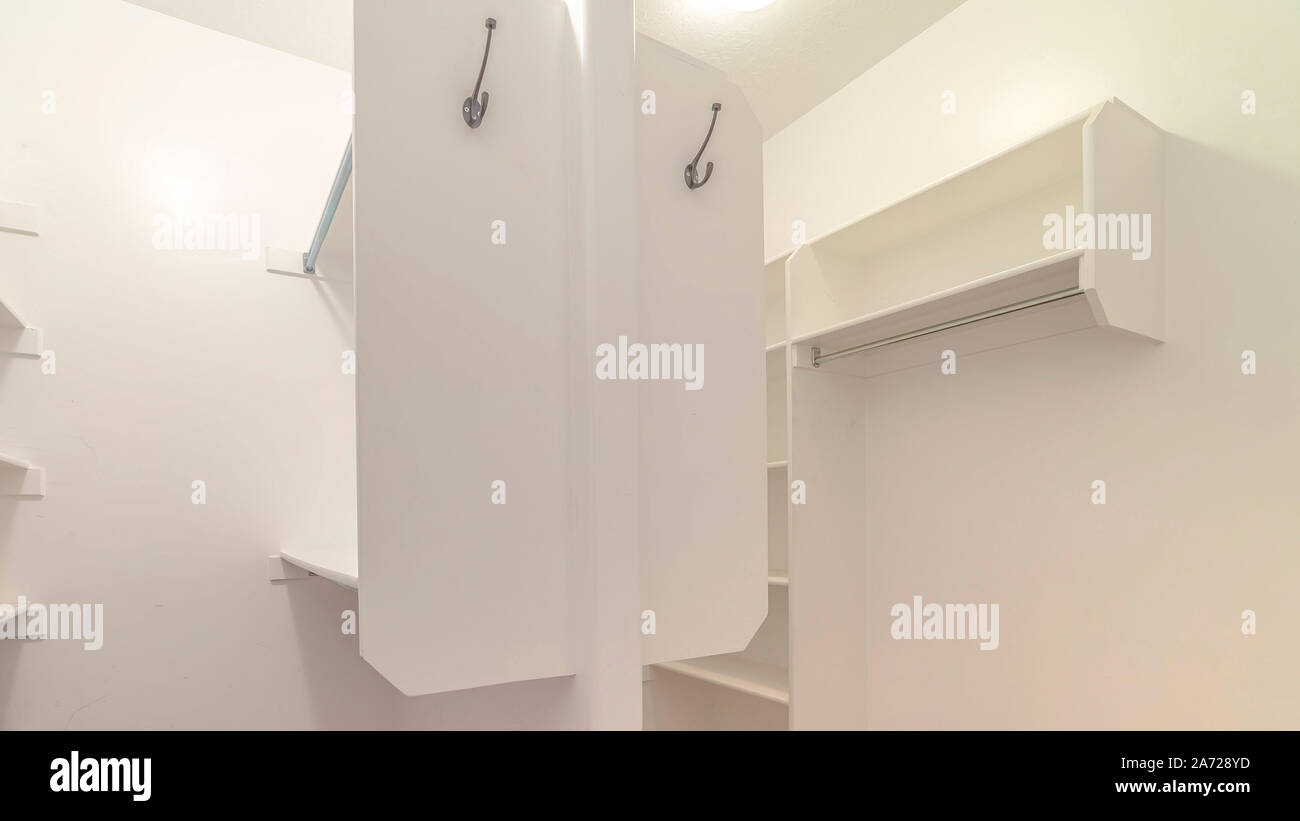 Panorama frame Interior of a dual walk in wardrobe Stock Photo - Alamy