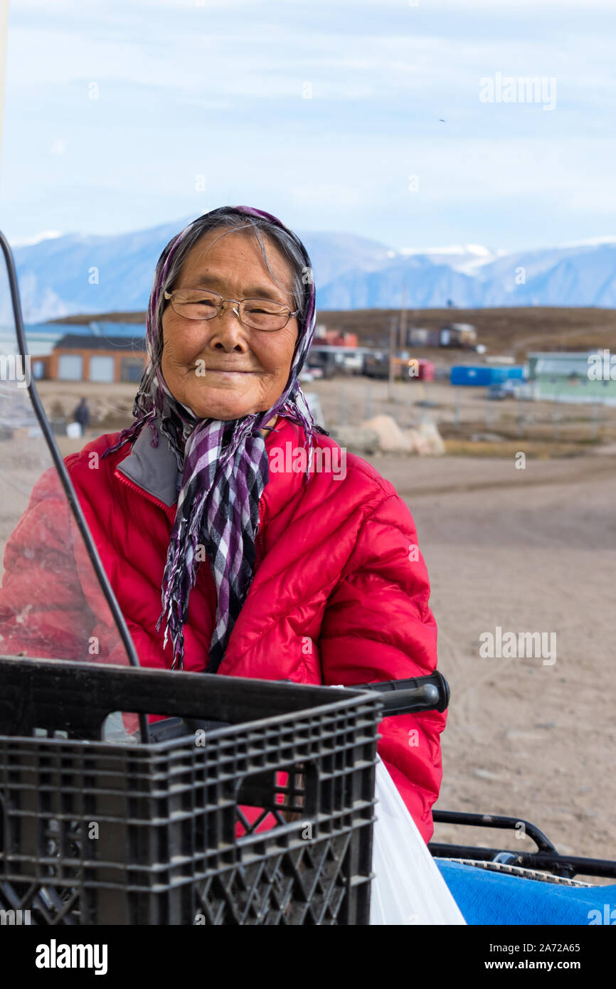 Portrait of a eskimo - inuit senior woman outdoors in Pond Inlet ...