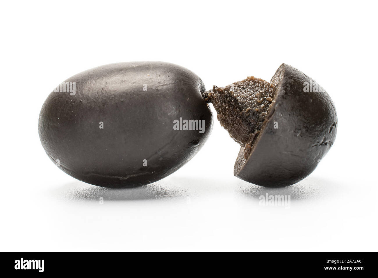 Group of one whole one half of canned black olive isolated on white ...