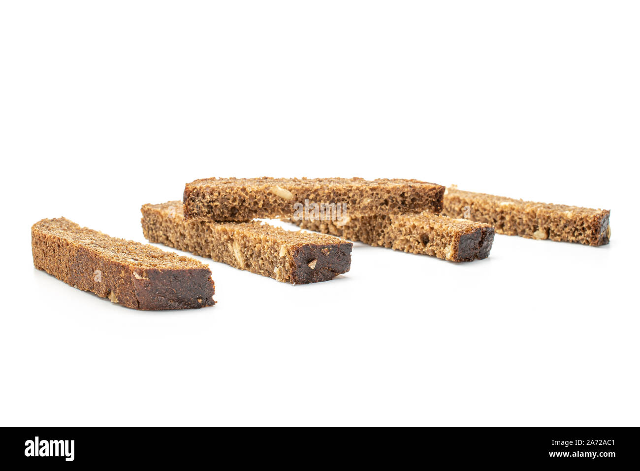 Group of five pieces of fresh baked dark bread isolated on white ...