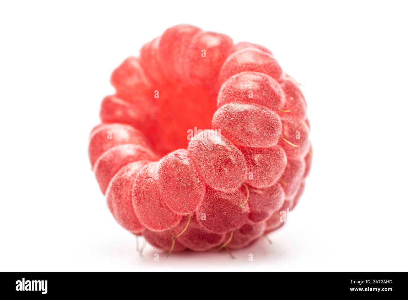 Group of four whole fresh crimson raspberry isolated on white ...