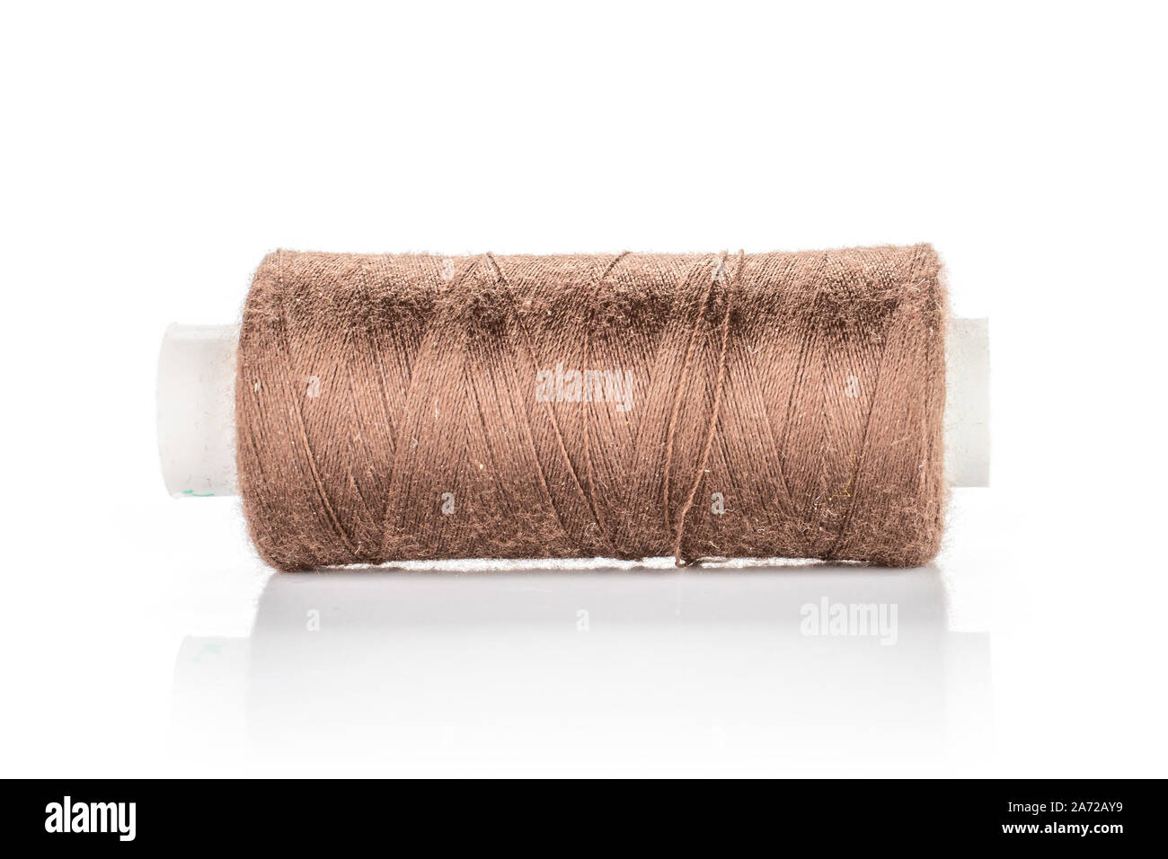 One whole haberdashery item thread spool isolated on white background ...