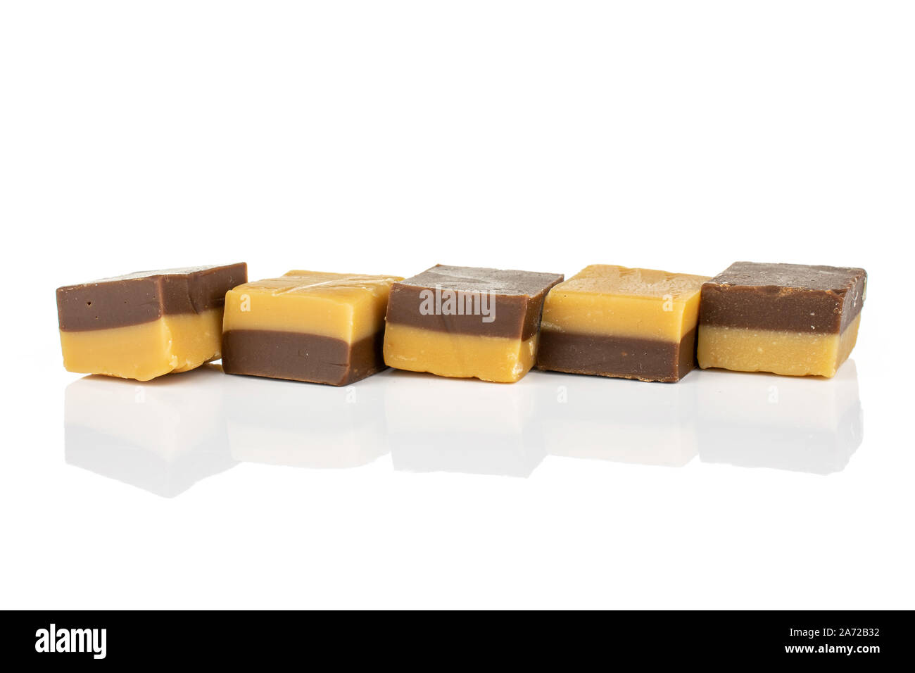 Group of five whole sweet brown caramel chocolate candy isolated on ...