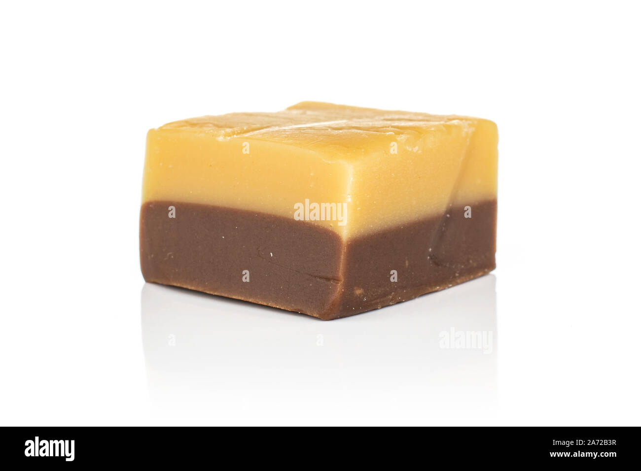One whole sweet brown caramel chocolate candy isolated on white ...